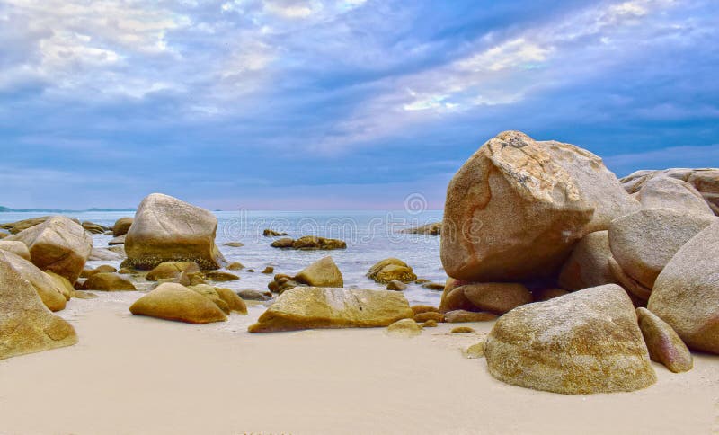 Large rocks on beach stock photo. Image of beach, beautiful - 260851096