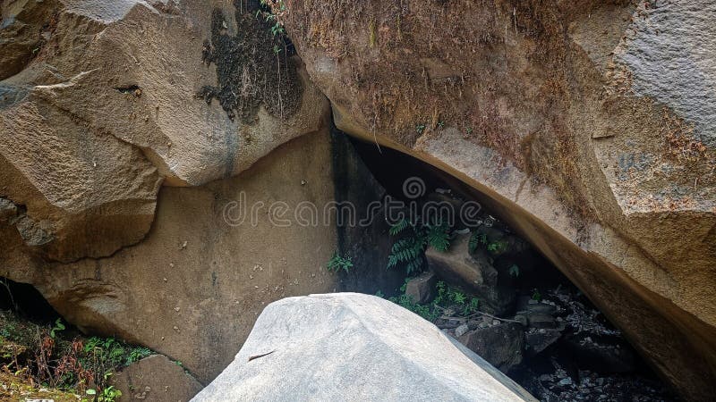 Large Rocks at the Edge of the Forest Like Cave Stock Image - Image of ...