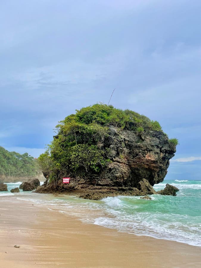 Large Rocks on the Edge of a Wide Beach Stock Image - Image of coast ...