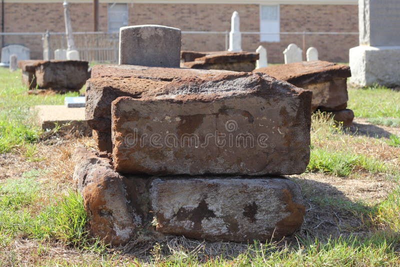 Large Rocks in Front of a Building and Graveyard Stock Image - Image of ...