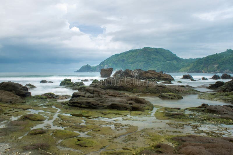 Large Rocks Hit by Ocean Waves Stock Image - Image of rocks, hill ...