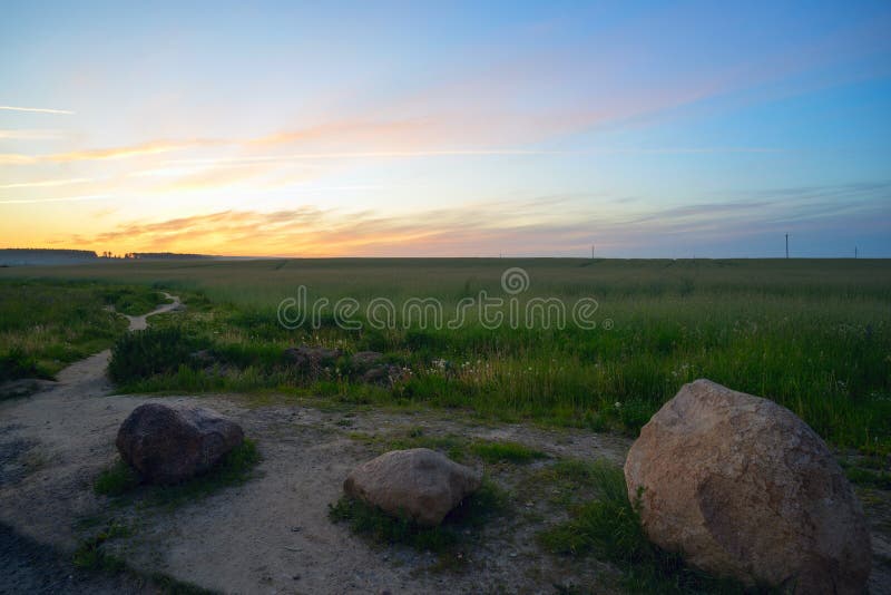 Large Rocks Lie on the Edge of the Field. Stock Photo - Image of grow ...