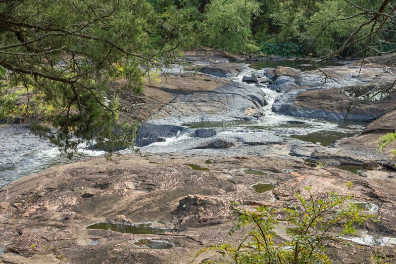 Large Rocks Making Up Riverbed with Low Water Level Surrounded by Green ...