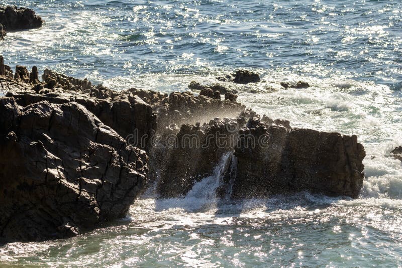 Large rocks in the ocean stock photo. Image of large - 141202800
