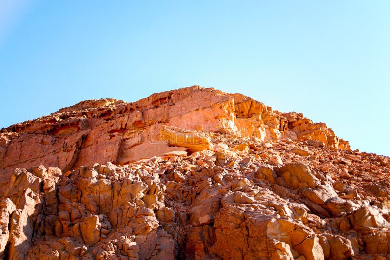 Rocks of Rock in a Red Canyon through Which Rays of Light Break through ...