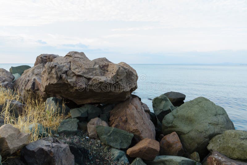 Large Rocks on the Seashore Stock Photo - Image of rock, sand: 77591212
