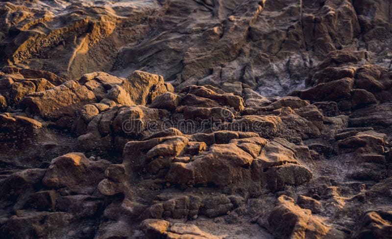 A Large Rocks Surrounded by Waves of the Ocean Stock Photo - Image of ...