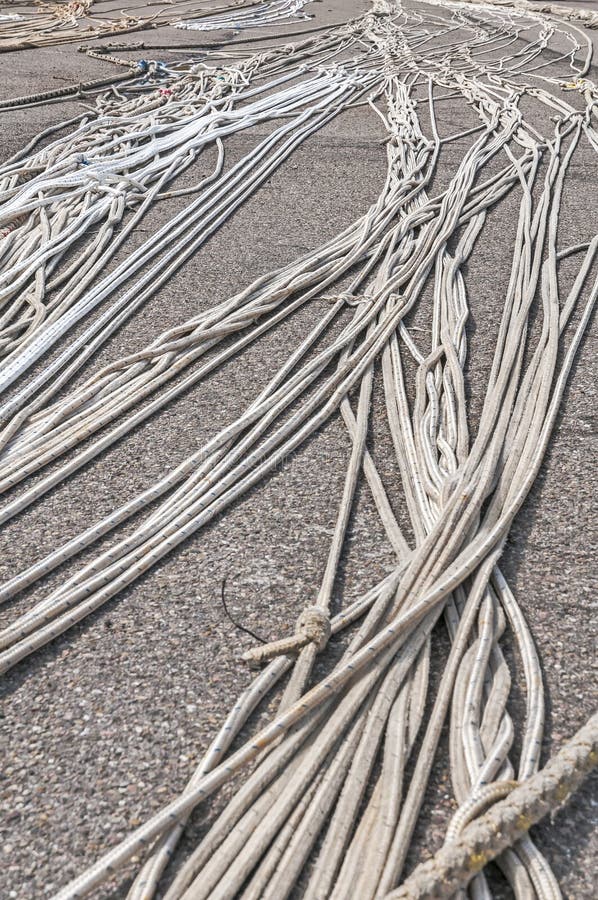 Large Ropes Spread Out on the Harbour Quay Stock Image - Image of ...