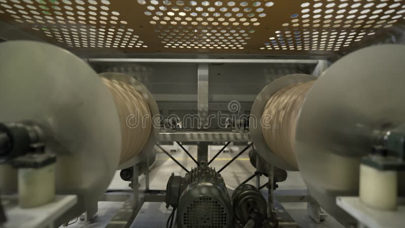 Large Rotating Rollers Create Rope Shape of Cardboard Surface Stock ...