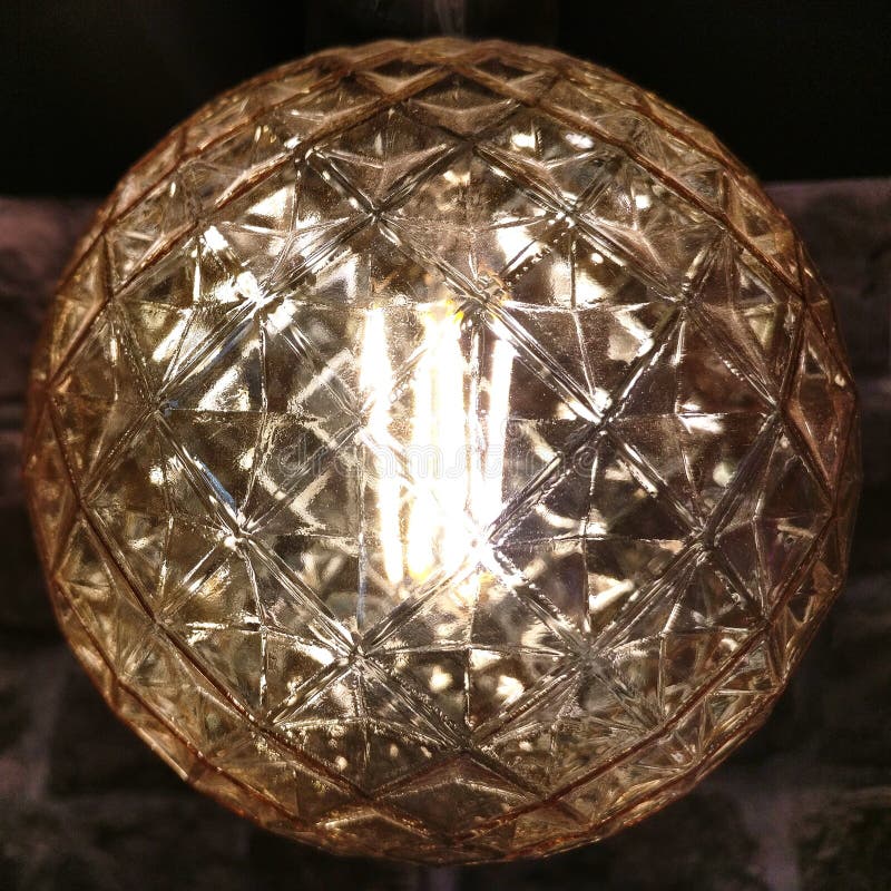 Large Round Glass Lamp on Dark Background Stock Image - Image of gold ...