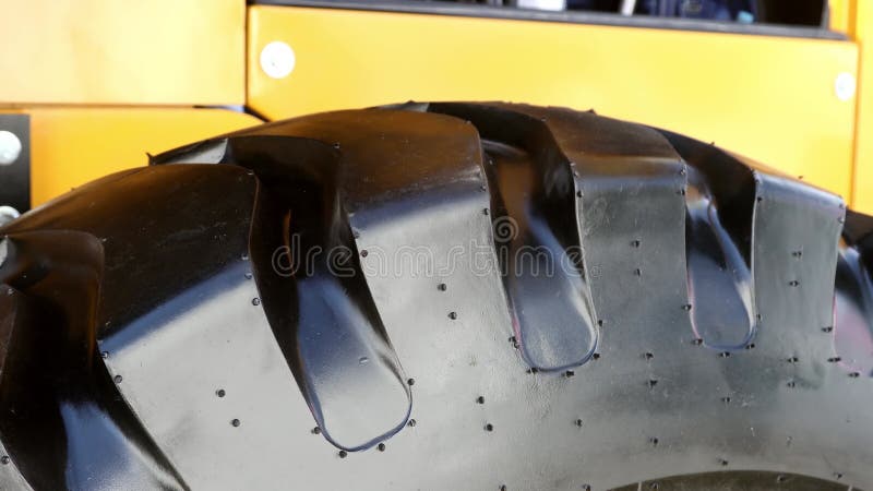 Large Rubber Wheels of a Tractor, Grader, Bulldozer Stock Footage ...