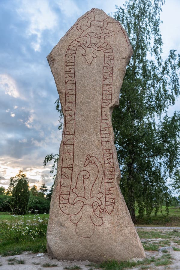Large Rune Stone with Runes in the Shape of a Long Red Snake Stock ...