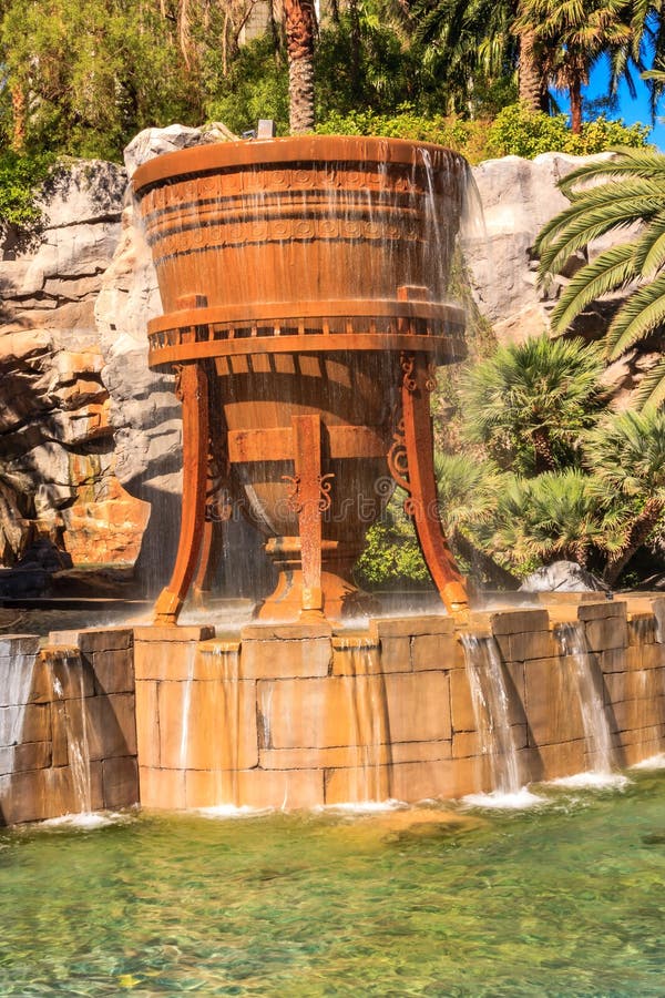 A Large, Rustic Barrel with Water Flowing Out of it Stock Image - Image ...
