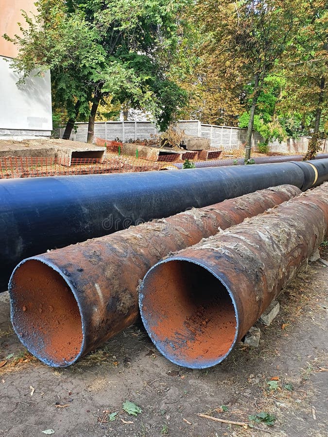 Large Rustic Metal Pipes at Construction Site during Replacement ...