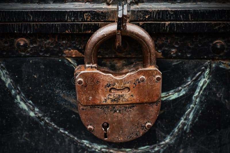 A Large Rusty Padlock Hangs on an Old Chest Stock Image - Image of lock ...