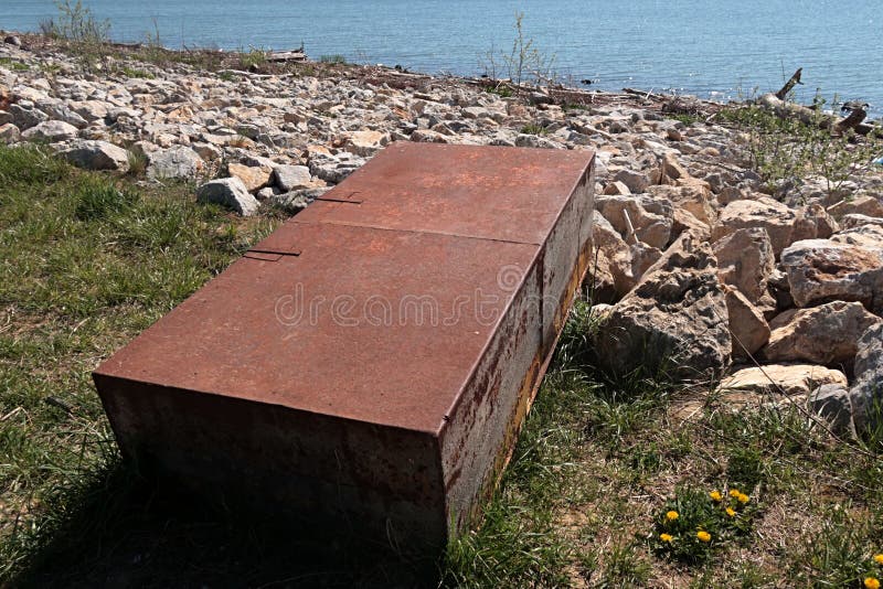 Large Rusty Rectangular Steel Chest Placed on Rocky River Bank As ...