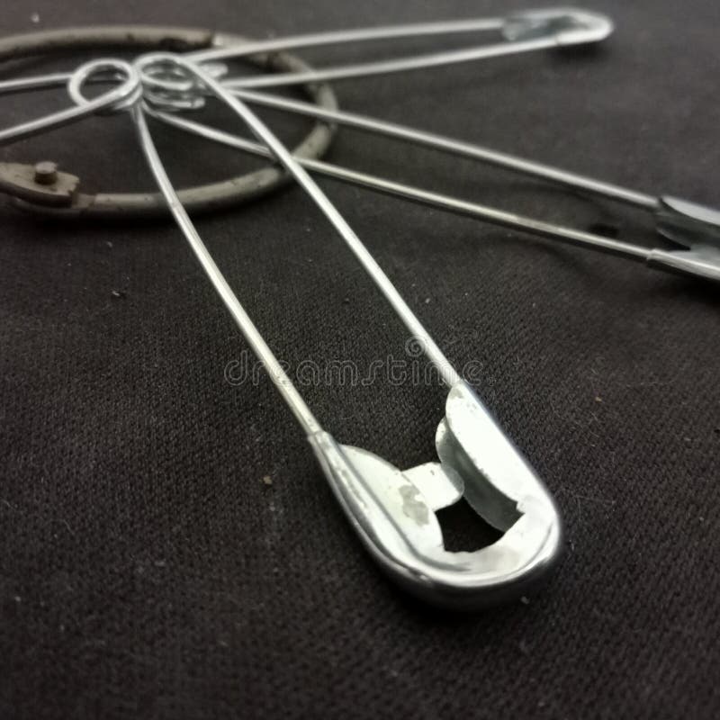 A Large Safety Pin Made of Iron Stock Photo - Image of safety, circle ...