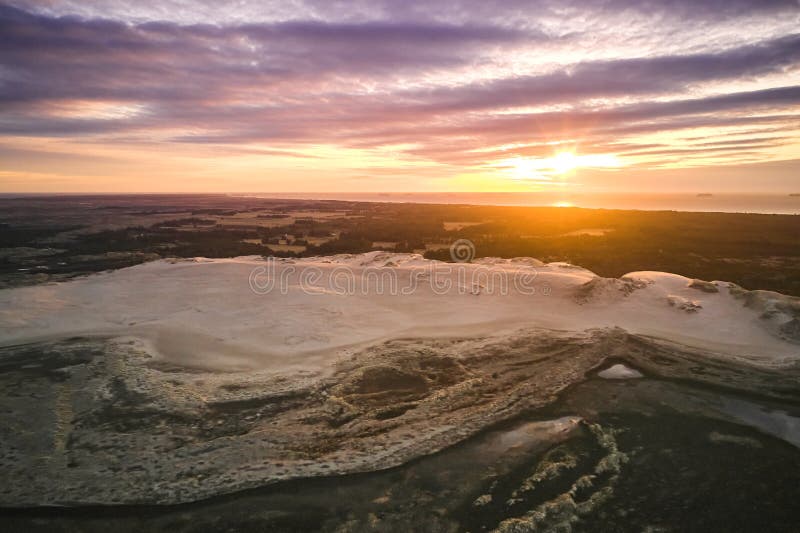 Large sand dune on beach stock photo. Image of large - 257583428