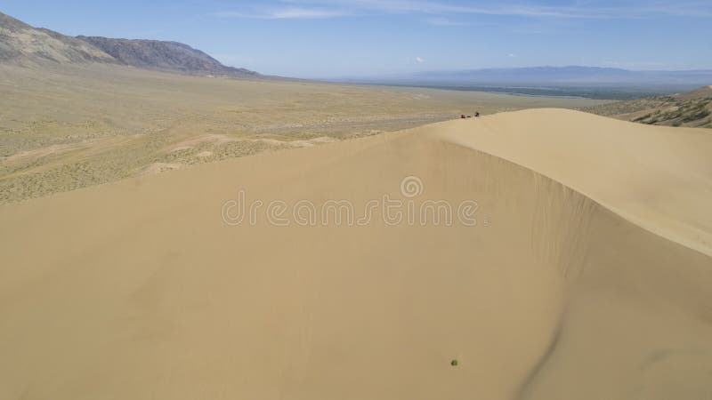 A Large Sandy Dune in the Middle of the Steppe Stock Image - Image of ...