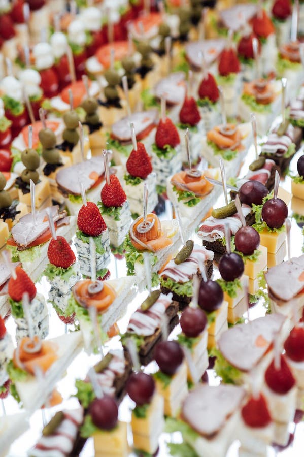 A Large Selection of Various Snacks for Guests on a Mirror Surface ...