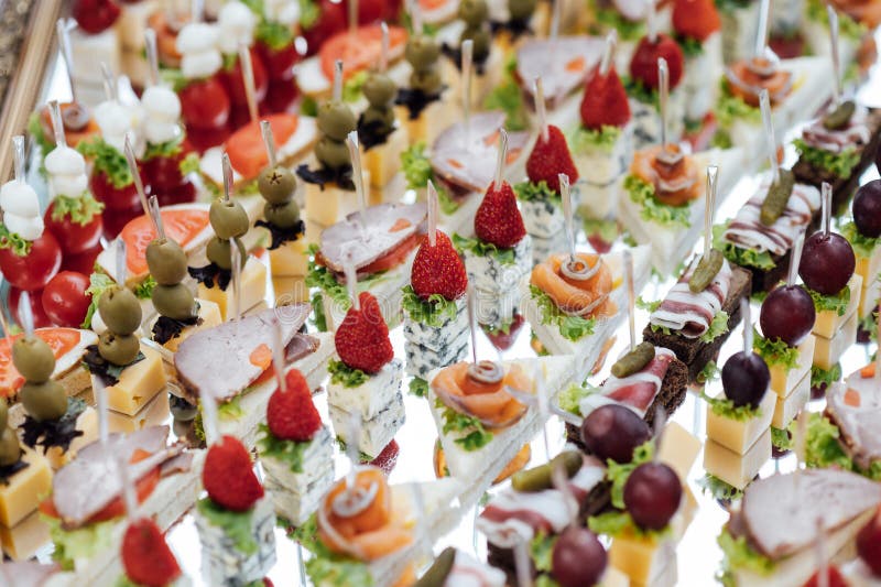 A Large Selection of Various Snacks for Guests on a Mirror Surface ...
