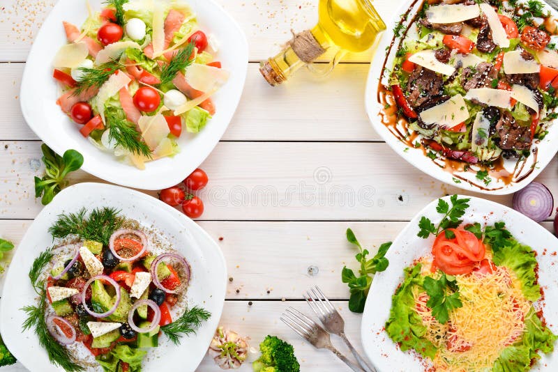 A Large Selection of Vegetable Salads. Top View Stock Photo - Image of ...