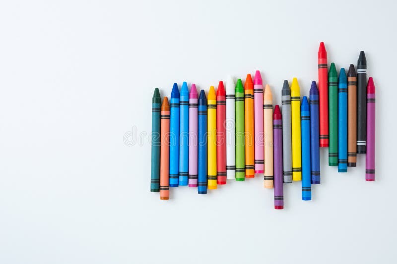 A Large Set of Multi-colored Children S Wax Crayons on a White ...
