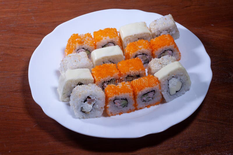 Large Set of Rolls on a Plate Stock Image - Image of large, black ...