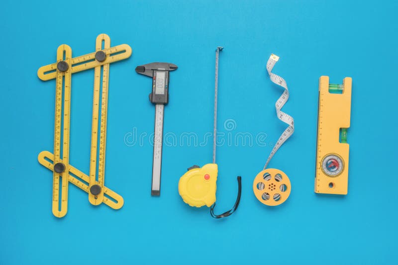 A Large Set of Various Measuring Instruments on a Blue Background Stock ...