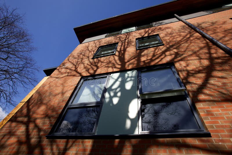 Large Shadow Cast Onto a Residential Building Stock Image - Image of ...