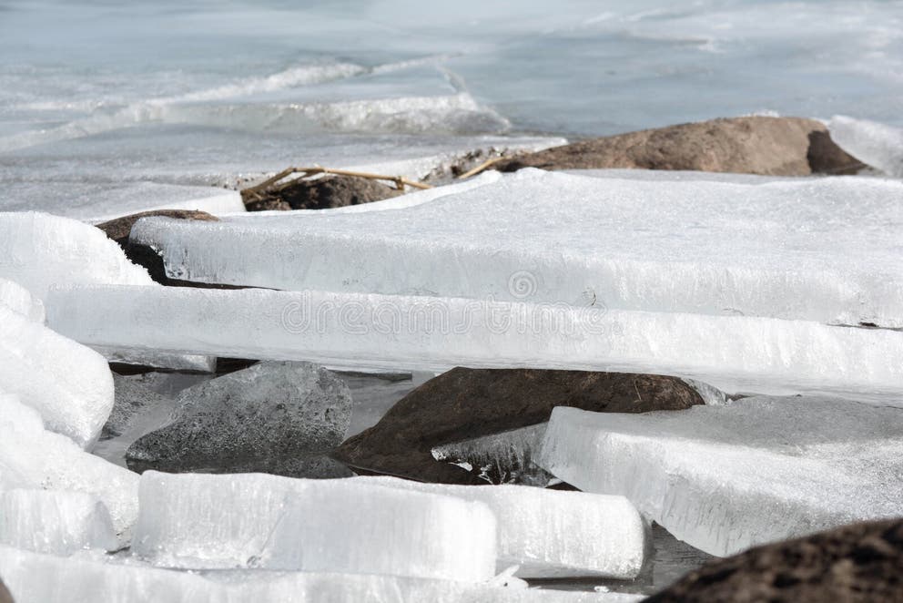 Ice sheets on the lake stock photo. Image of formation - 374029080
