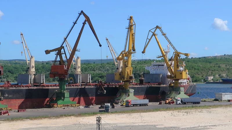 A Large Ship Loading Grain with Cranes for Export Stock Video - Video ...