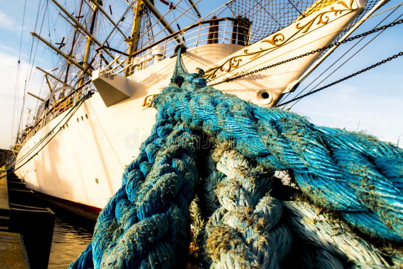 A Large Ship is Moored with Ropes. Stock Photo - Image of rope ...