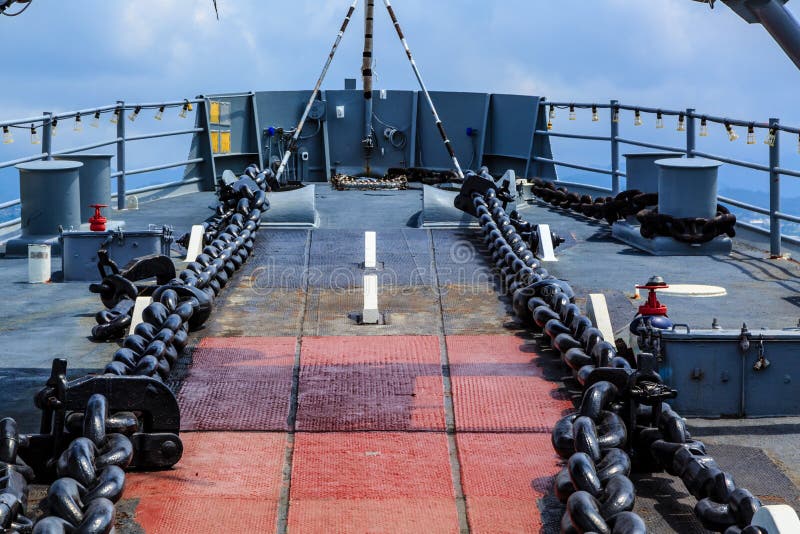 A Large Ship with a Red and Black Chain Link Walkway Stock Image ...