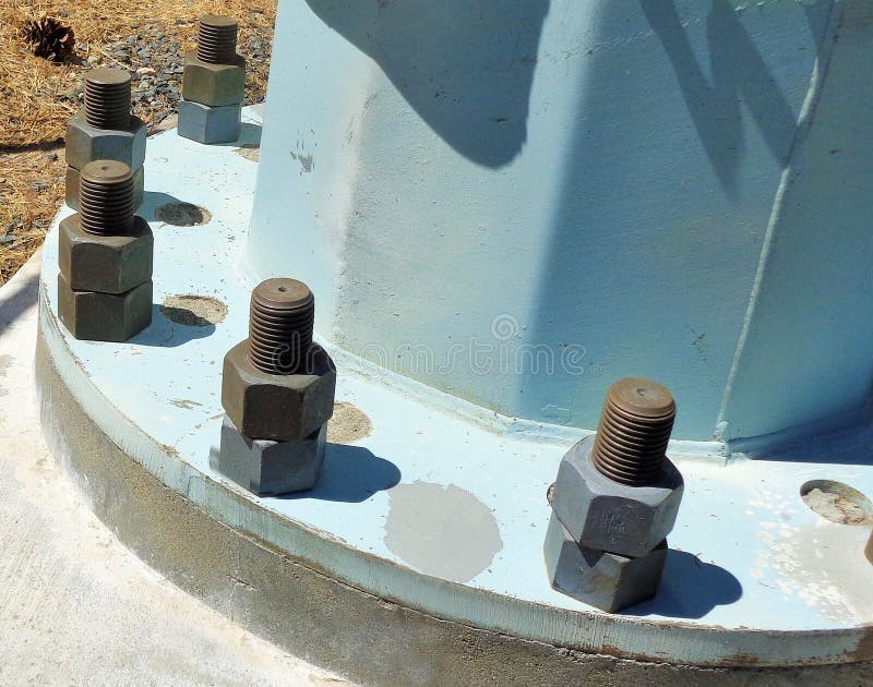 Large Size Nuts and Bolts at the Base of a Pillar Stock Image - Image ...