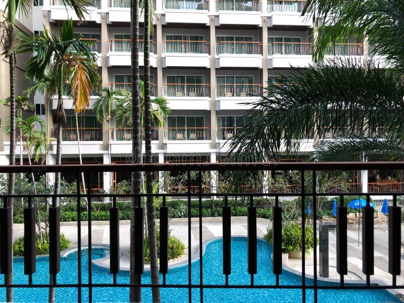 A Large Size Swimming Pool among High Rise Buildings Stock Photo ...