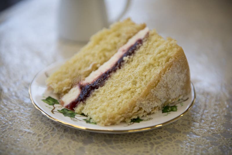Victoria Sponge Cake with Raspberry Jam and Cream Stock Photo - Image ...