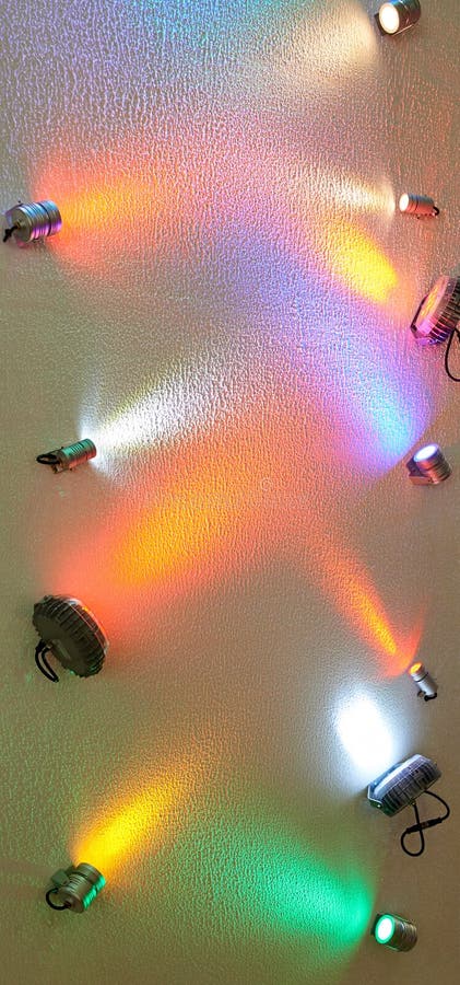 Large and Small Colored Led Spotlight on the Wall. Stock Photo - Image ...