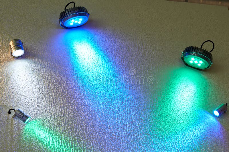 Large and Small Colored Led Spotlight on the Wall. Stock Image - Image ...