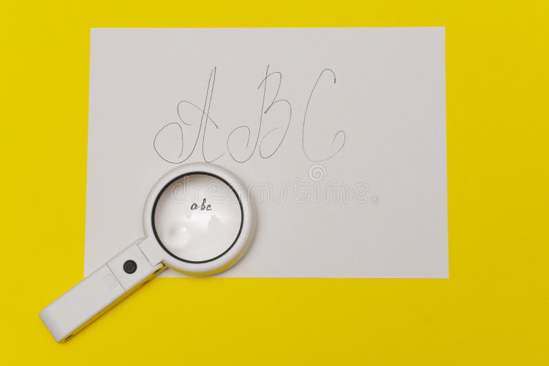 Large and Small Handwritten Letters of the Alphabet and Magnifier Stock ...