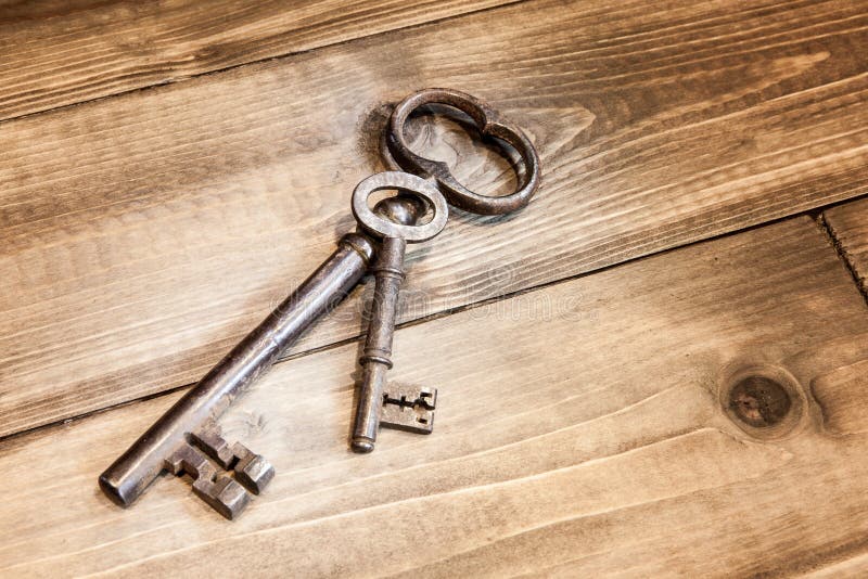 Antique Skeleton Key on Old Distressed Wood Planks Stock Image - Image ...