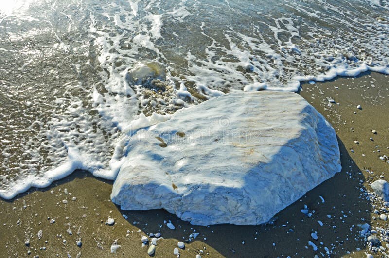 A Large Smooth Block of White Marble on the Coast Stock Photo - Image ...