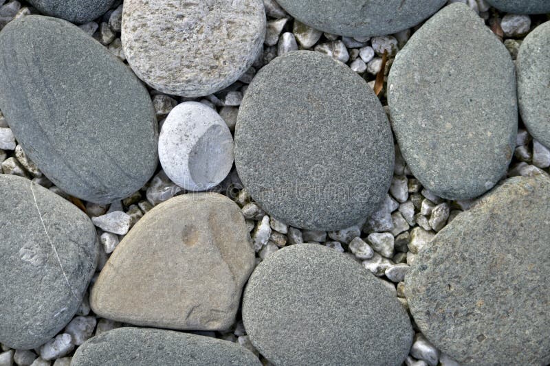 Large Smooth Different in Shape and Color Stones on Small Sharp Stock ...