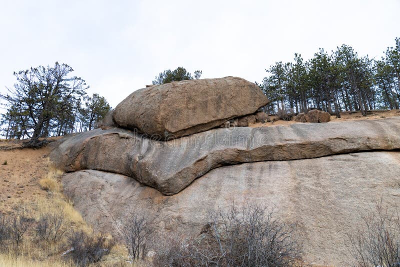 Large Smooth Stone Surface with a Balanced Boulder on a Mountain Face ...