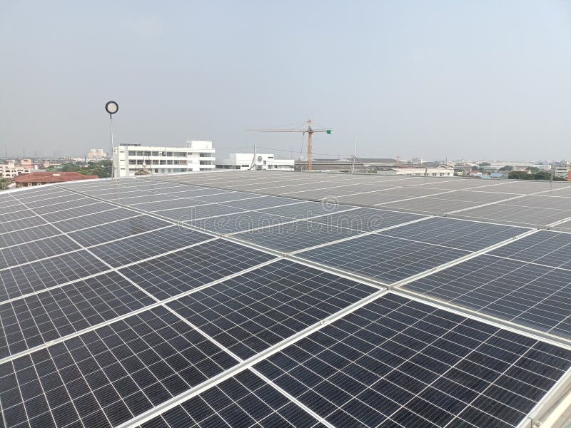 A Large Solar Panel is on the Roof of a Building. Stock Photo - Image ...