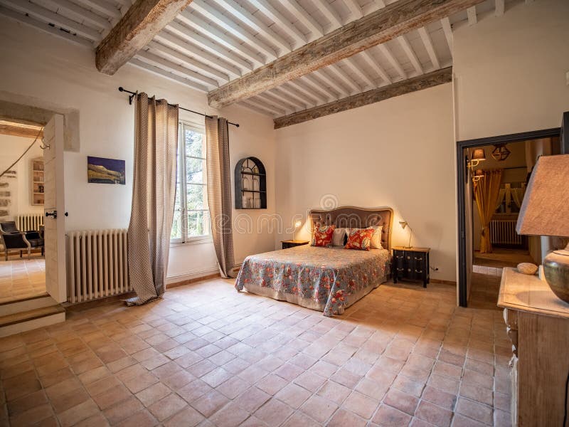 Large Spacious Room with Thick Curtains, a Vintage Bed, a Bedside Table ...