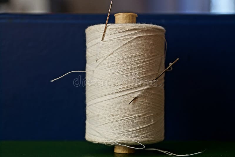 Large Spool of White Thread with Needles Stock Photo - Image of ...