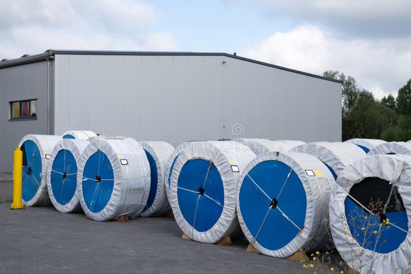 Large Spools of Material Stored Outside a Modern Warehouse Stock Image ...