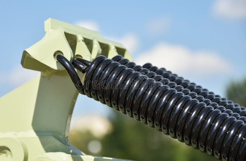 Large Springs of a Machinery Stock Image - Image of agricultural, green ...