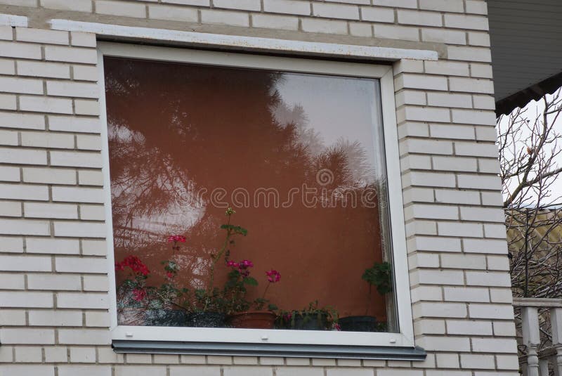 Large Square Window on a Gray Brick Wall of a Building Stock Image ...